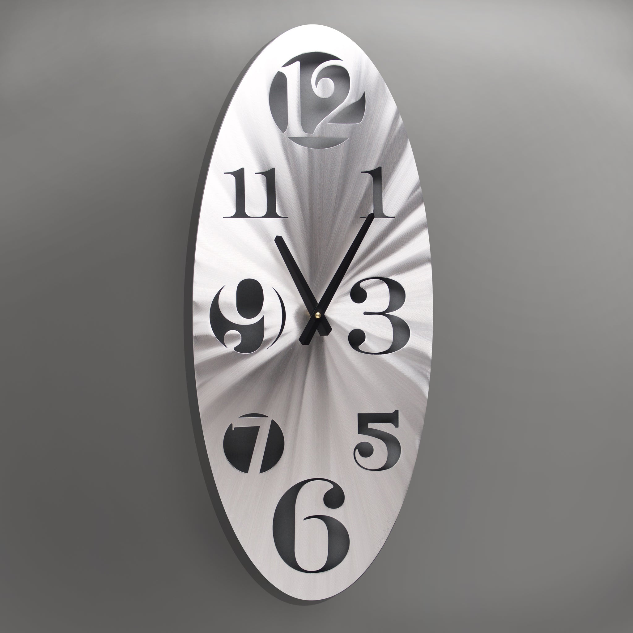 Vertical Ellipse Clock – Sondra Gerber - Metal Petal Art